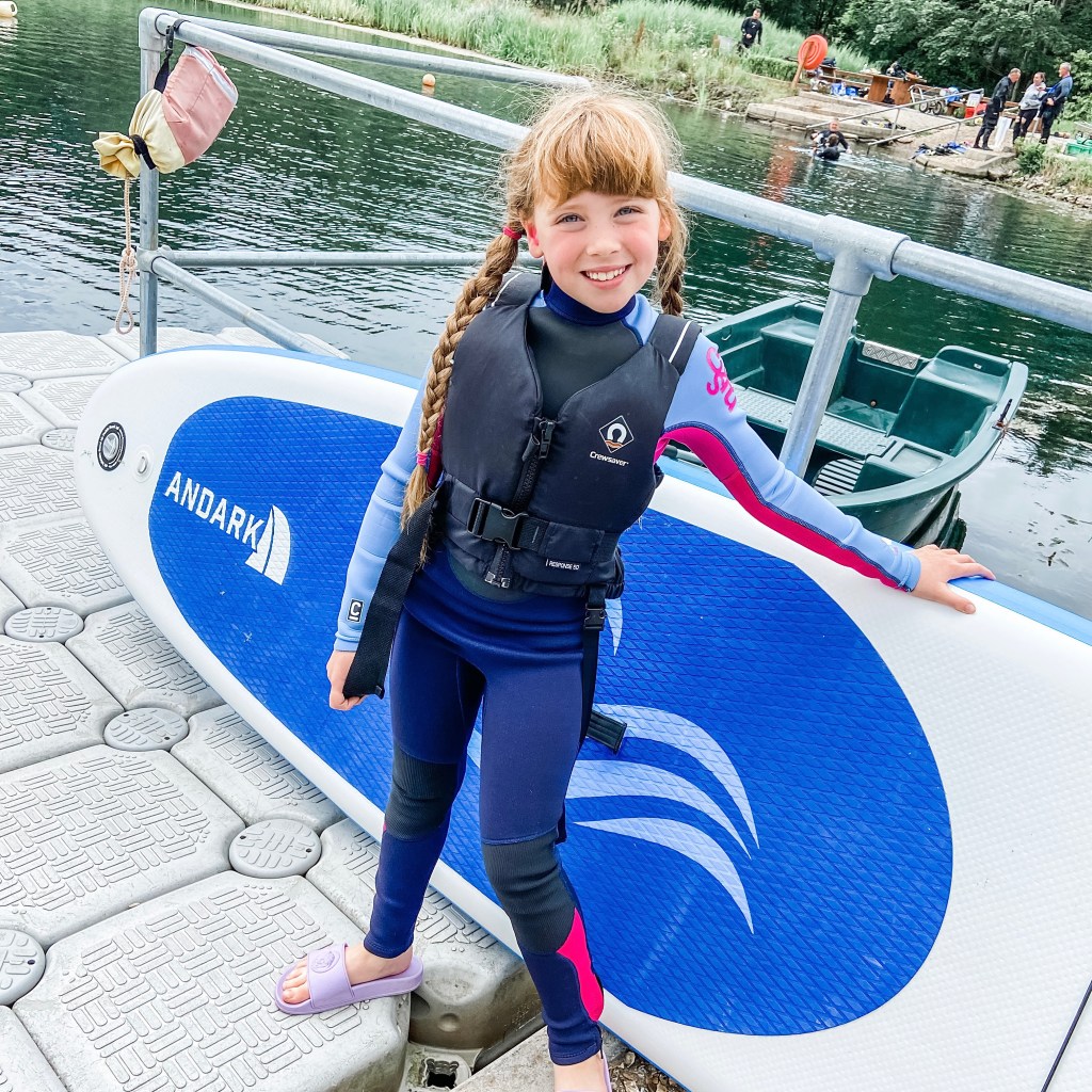 Having fun at Andark Lake paddleboarding!