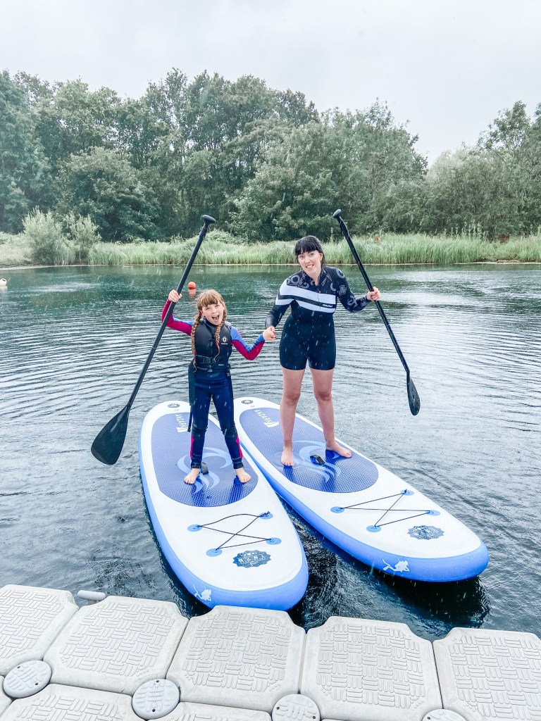 Having fun at Andark Lake paddleboarding!